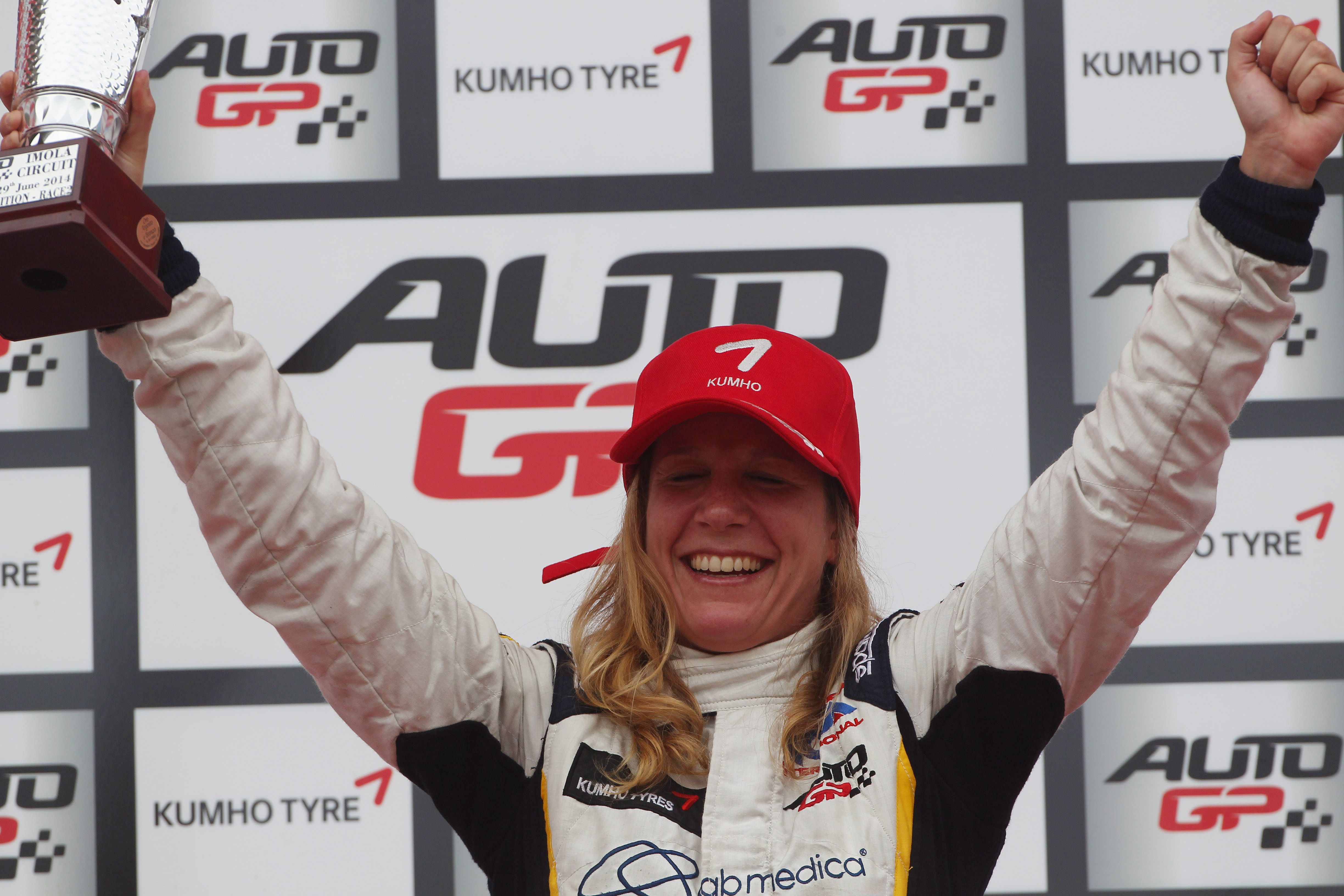 Michela Cerruti celebrates on the podium at Imola - Littlegate Publishing
