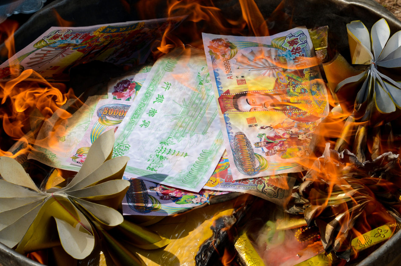 Burning "Ghost money" paper on Chinese New Year February 7, 2016 ...